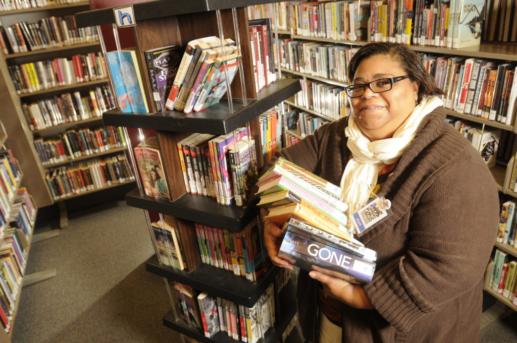 Bookworm: Librarian turned childhood passion into fulfilling career ...